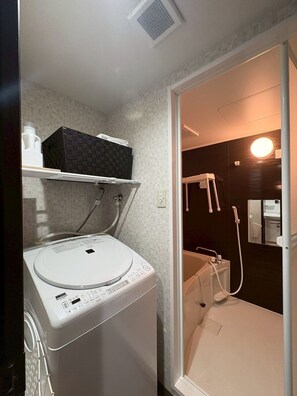 Casa Deluxe, varanda | Casa de banho | Chinelos 