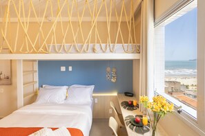 Apartamento luxo, cozinha, vista para a praia | Wi-Fi de cortesia, roupa de cama