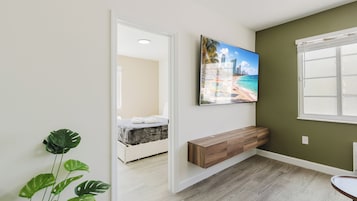 Apartamento urbano | Área de estar | Smart TV 46 polegadas com canais a cabo