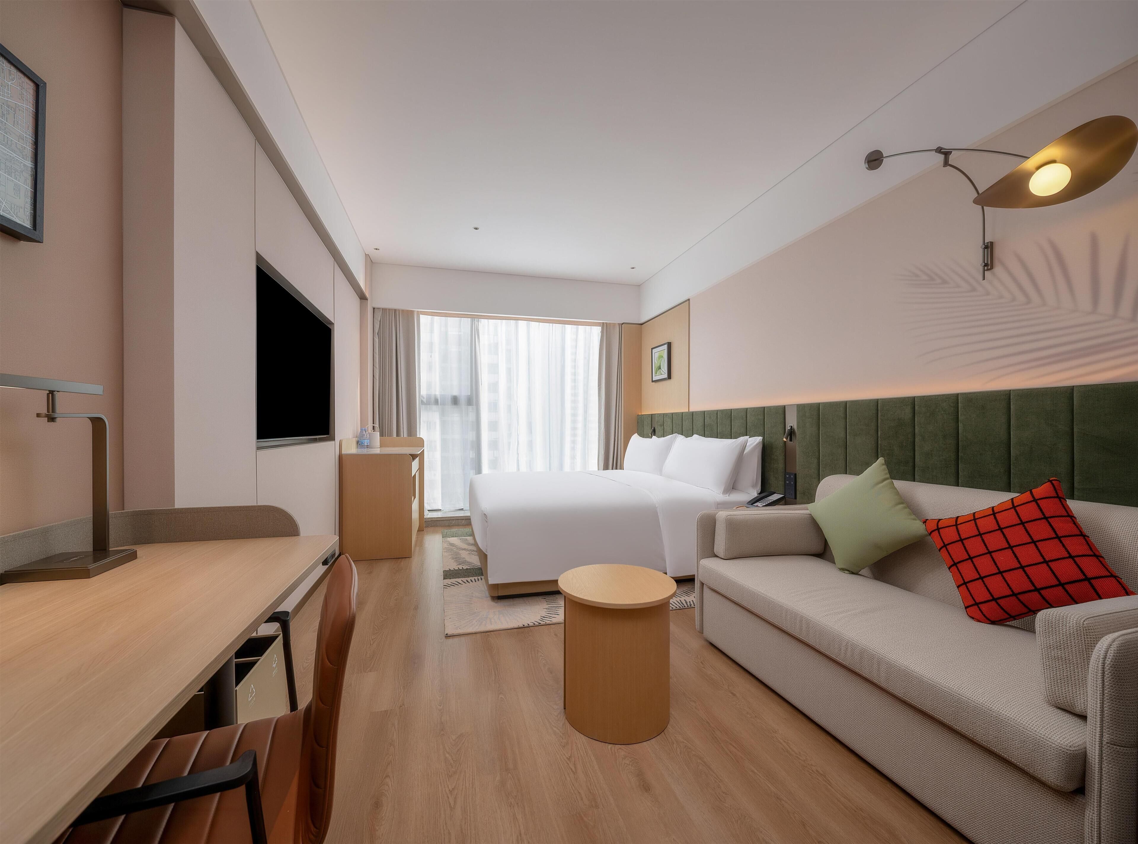 Quarto luxo, 1 cama King e sofá-cama | Área de estar