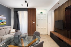 Apartamento, Vista para a cidade | Sala de estar