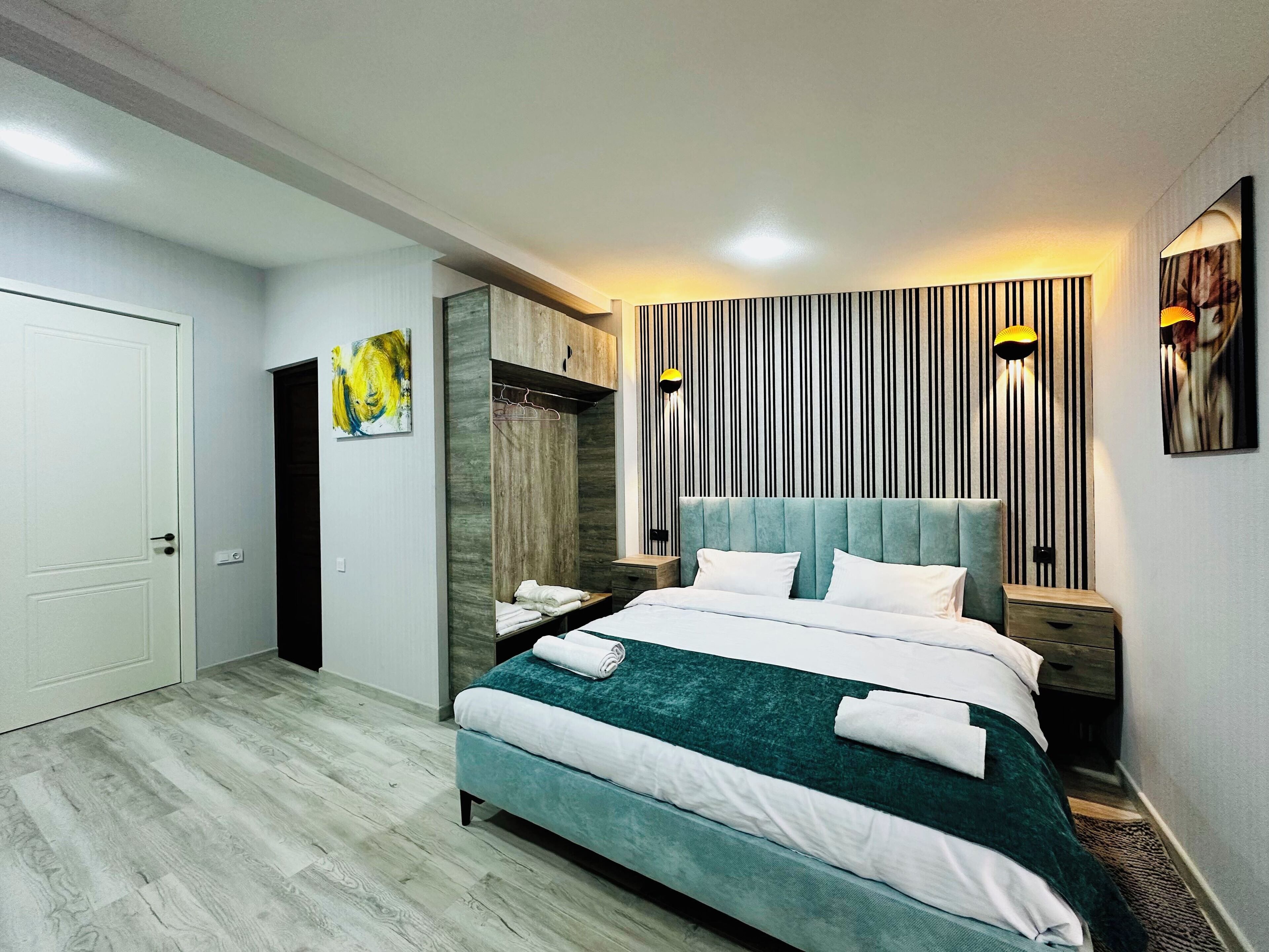 Quarto Quádruplo Familiar, varanda, Vista para a cidade | Secretária, Wi-fi grátis 