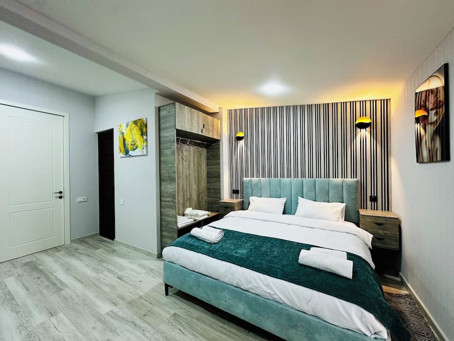 Quarto Quádruplo Familiar, varanda, Vista para a cidade | Secretária, Wi-fi grátis