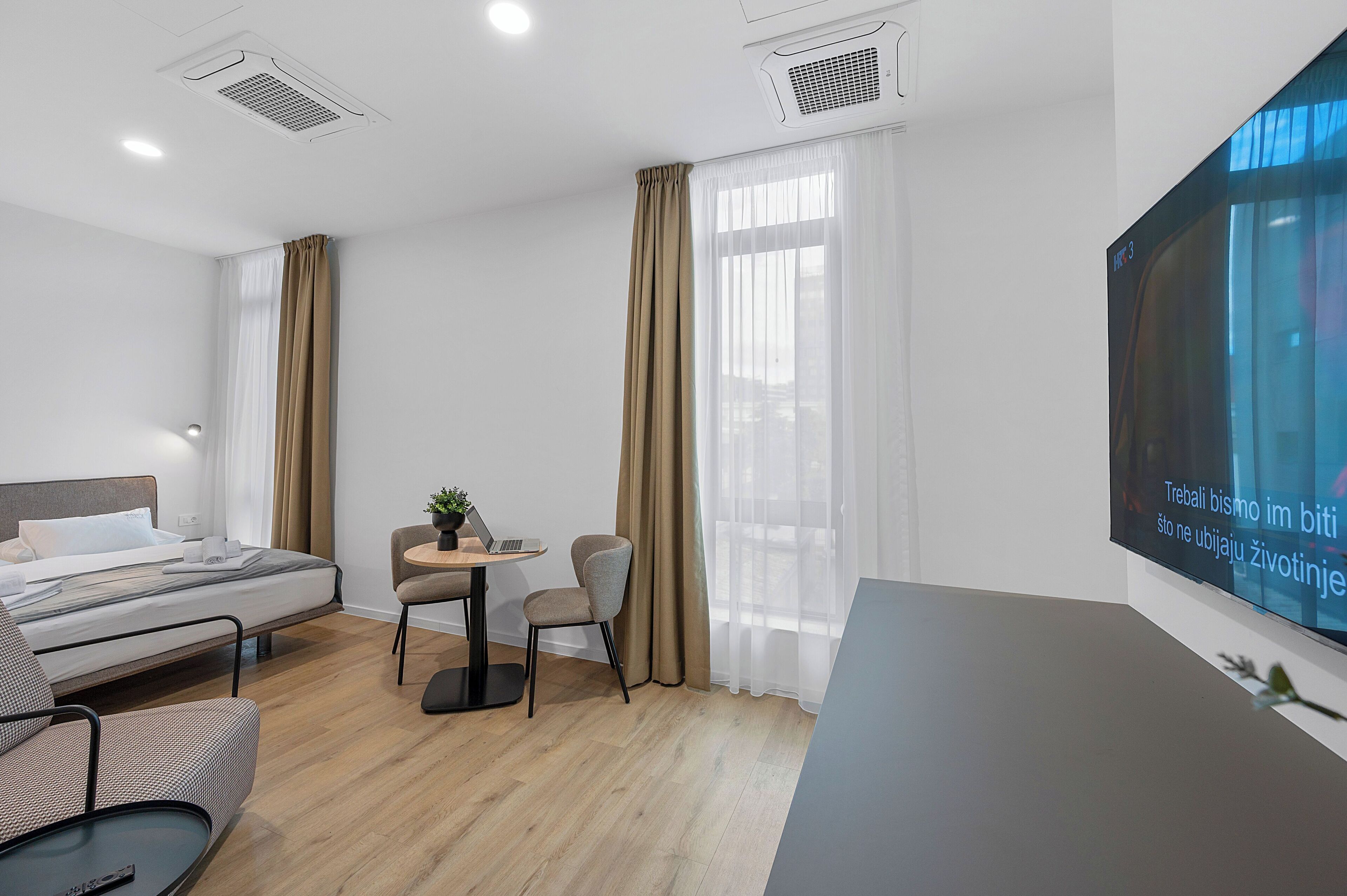 Suíte estúdio standard | Área de estar | TV