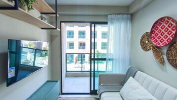 Apartamento família | Área de estar