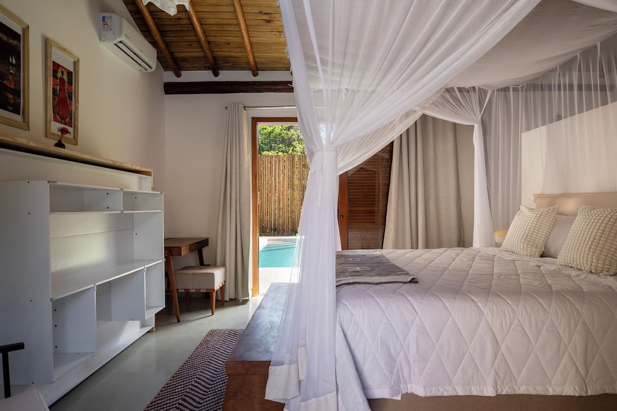 Casa Deluxe, vista para a piscina | Secretária, berços/camas para crianças grátis, berço de viagem