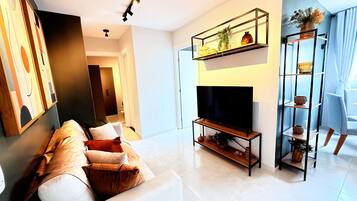 Apartamento Deluxe | Sala de estar