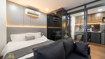 Apartamento, 1 quarto | Secretária, secretária adequada para computadores portáteis