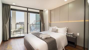 Apartamento Deluxe, 2 quartos | Vista do quarto