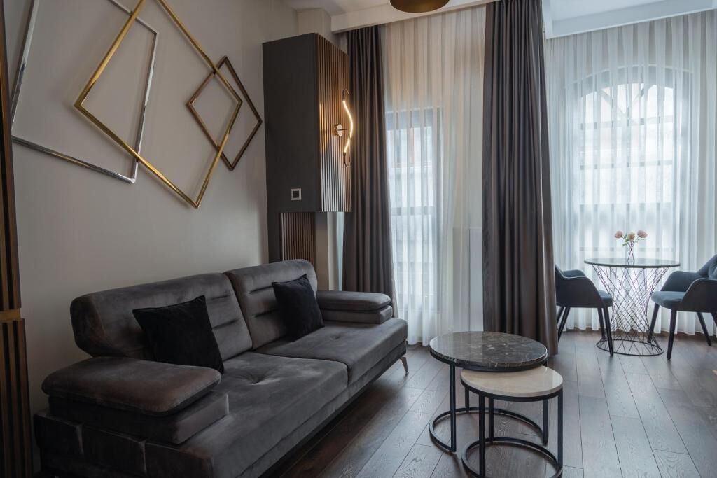 Suíte superior, vista para o mar | Área de estar