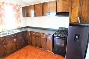 Villa Deluxe, vista para a praia | Cozinha privada