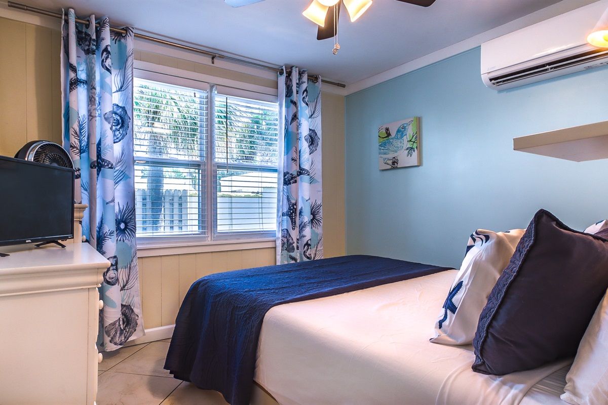 Bungalow, 1 cama queen-size e sofá-cama, aceitam-se animais de estimação, vista para o jardim | Ferro/tábua de engomar, Wi-fi grátis 