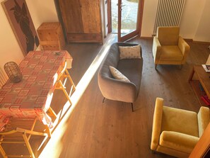 Duplex, sacada, vista para o jardim | Área de estar