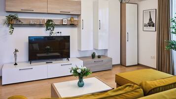 Apartamento Familiar, 3 quartos, vista para o jardim | Sala de estar