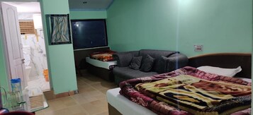 Quarto quádruplo luxo | Área de estar