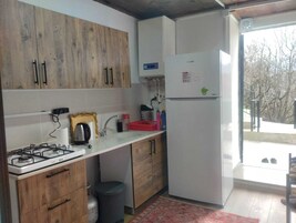 Casa Familiar, 2 quartos, pátio, vista para o jardim | Cozinha privada