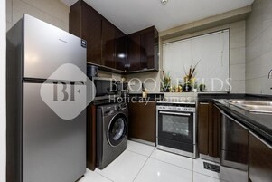 Apartamento, varanda, Vista para a cidade | Cozinha privada