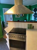 Apartamento Comfort, várias camas, quartos comunicantes, vista para o jardim | Cozinha privada