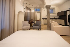 Suíte estúdio exclusiva | Espaço de trabalho para notebook, quartos à prova de som