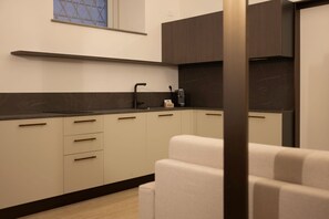 Suíte estúdio exclusiva | Cozinha privada | Geladeira, micro-ondas, cooktop, lava-louças