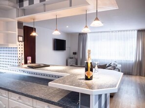 Apartamento, 2 quartos | Bar (no alojamento)