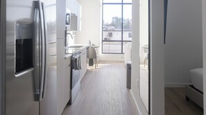 Estúdio (0 Bedroom) | Área de estar | Smart TV 50 polegadas com canais digitais, pebolim