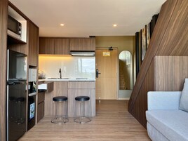 Quarto Duplo Júnior, vista para a praia | Sala de estar