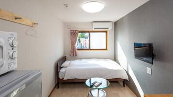 Quarto Individual Económico, fumadores | Wi-fi grátis, roupa de cama fornecida