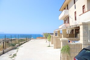 Apartamento, pátio, vista para o mar | Vista do quarto