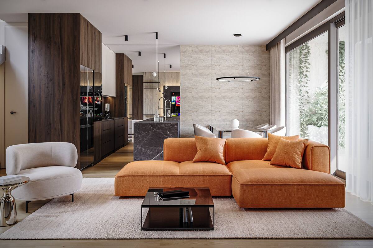 Uma sala de estar moderna com um sofá seccional, uma mesa de centro e uma área de jantar com cadeiras.