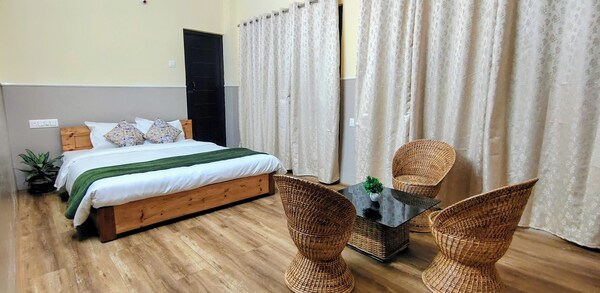 Beltola Lodge - A Serene Homestay - Assam