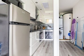 Condo luxo, vista para a montanha | Cozinha privada | Micro-ondas, máquina de café expresso, cafeteira/chaleira