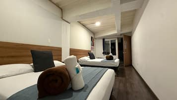 Quarto quádruplo família | Cortinas blackout, ferros/tábuas de passar roupa, Wi-Fi de cortesia