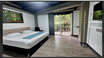 Apartamento conforto, sacada, vista para o jardim | Cortinas blackout, ferros/tábuas de passar roupa, Wi-Fi de cortesia