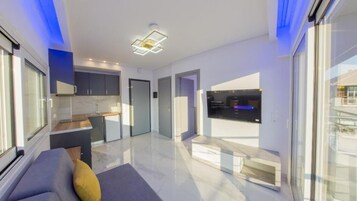 Apartamento, 1 quarto, sacada | Área de estar