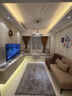 Apartamento, 1 quarto, acessível, Vista para a cidade | Sala