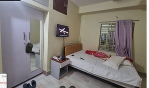 Quarto Duplo Deluxe, varanda, vista para o jardim | Vista do quarto