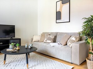 Apartamento, 2 quartos, vista para o jardim | Sala