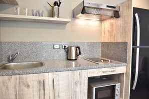 Estúdio Básico, 1 cama king-size | Cozinha privada