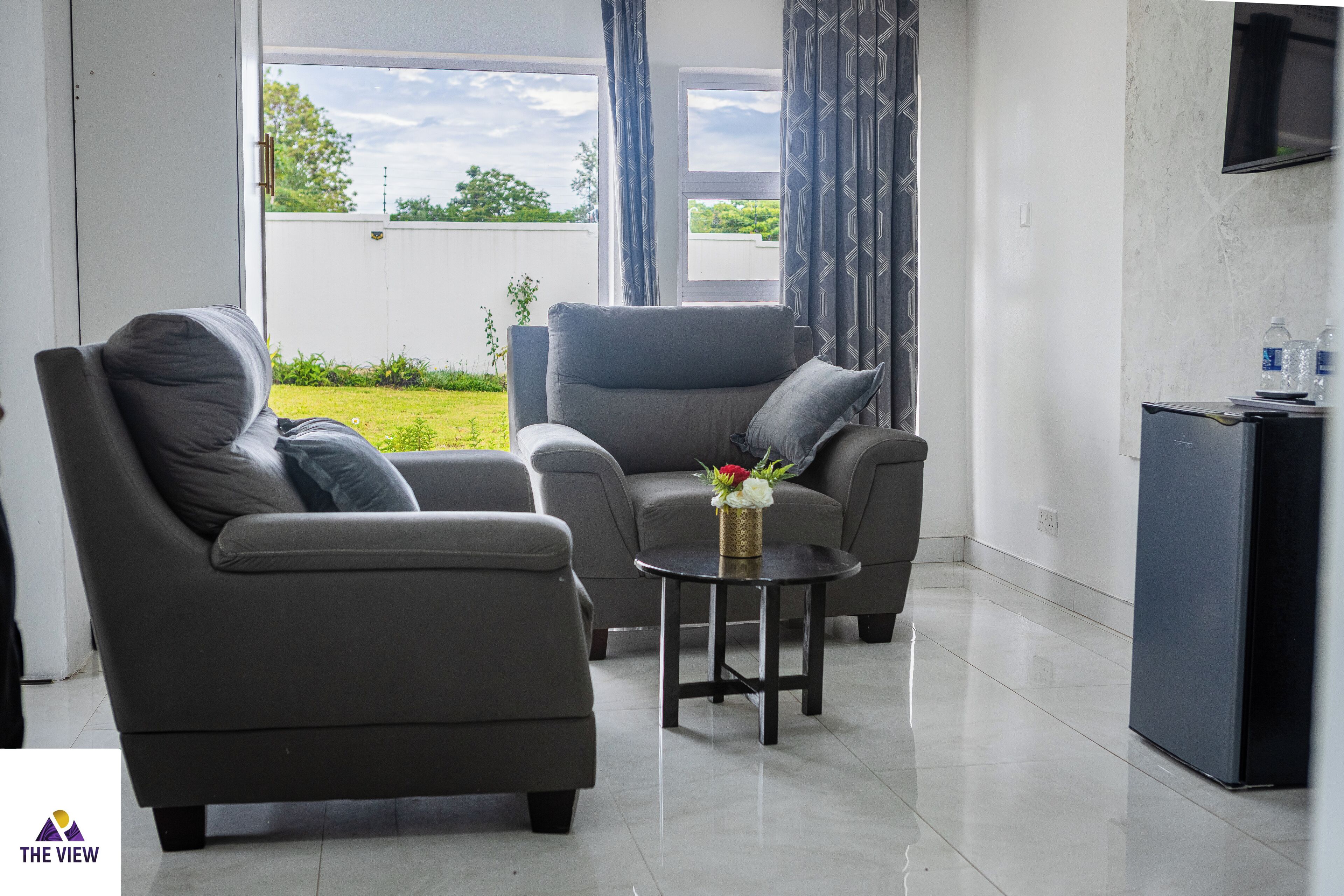 Quarto casal presidencial, vista para o jardim | Área de estar