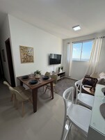 Apartamento Comfort, vista parcial para o oceano | Restaurantes