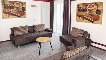 Quarto triplo família | Área de estar