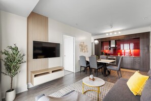 Apartamento Comfort, Vista para a cidade | Sala de estar