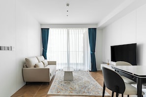 Apartamento, vista para a piscina | Cofre no quarto, Wi-fi grátis, roupa de cama fornecida 