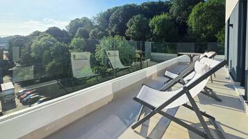 Quarto casal superior | Terraço/pátio
