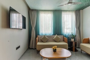 Suite, Vista para a cidade | Sala de estar | Monitores, impressoras 