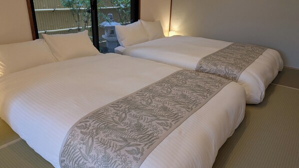 Suíte superior, vista para o jardim | Individualmente decorados, individualmente mobiliados, cortinas blackout