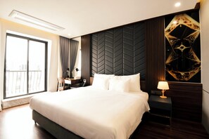 Suite Superior, 2 quartos, varanda | Lençóis de algodão egípcio, roupa de alta qualidade, edredões de penas 