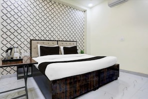 Quarto Deluxe, ar condicionado | Casa de banho | Toalhas fornecidas 