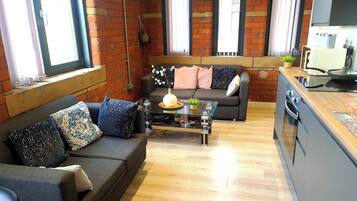 Apartamento, 2 quartos | Sala de estar